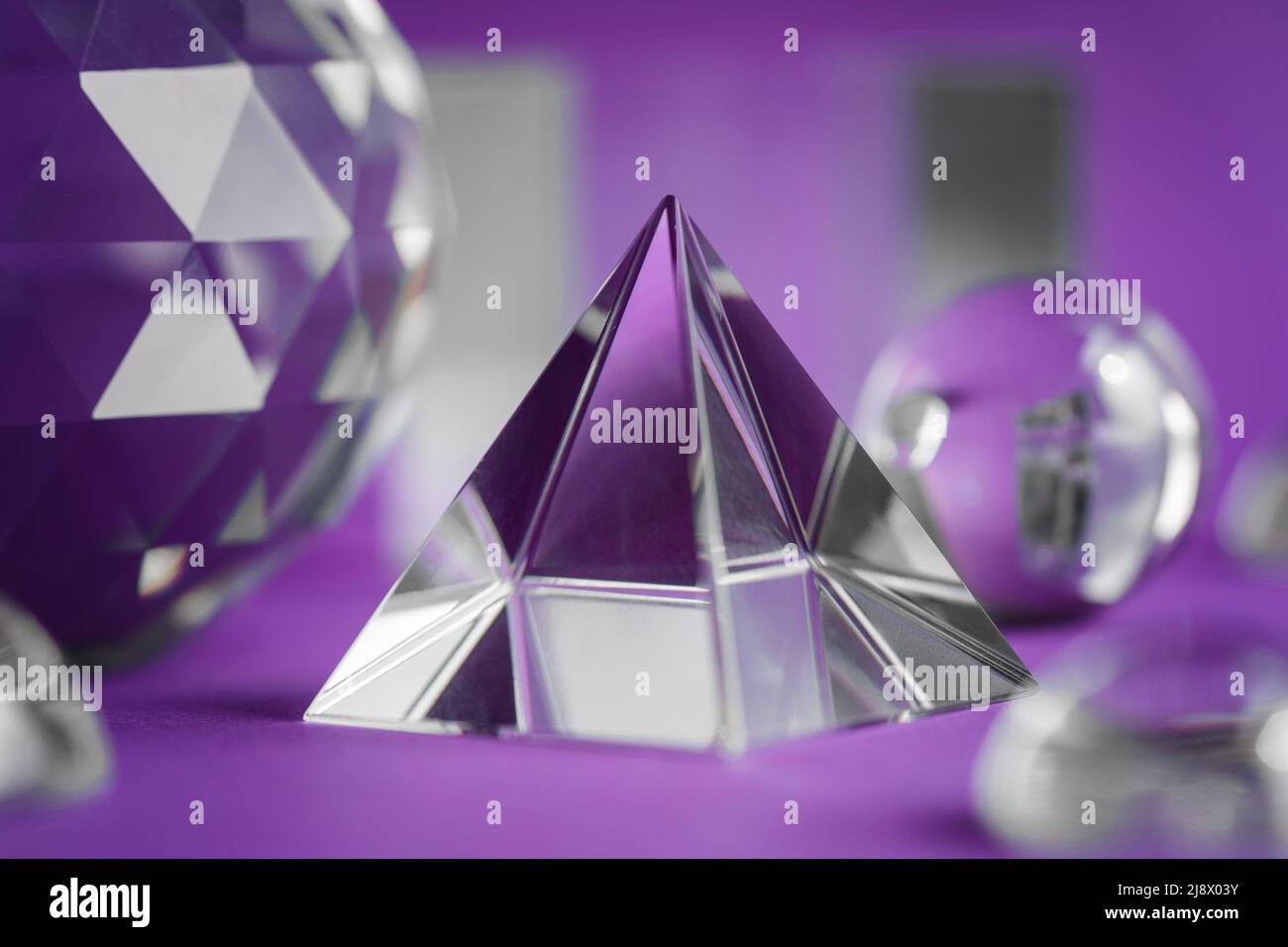Crystal prism refracting light, magic crystals and pyramid, sphere and ...