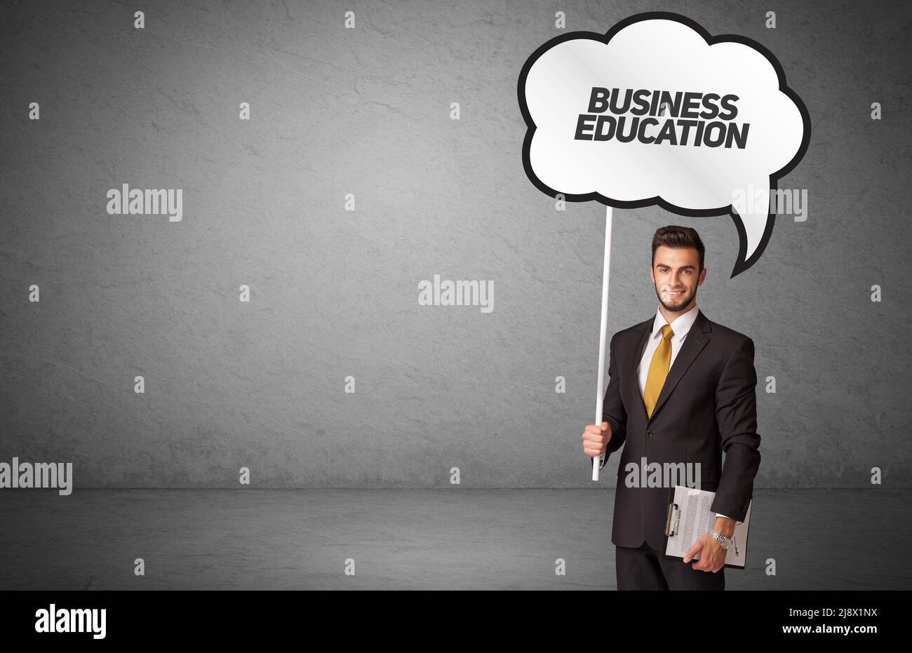 business person in casual holding road sign Stock Photo - Alamy