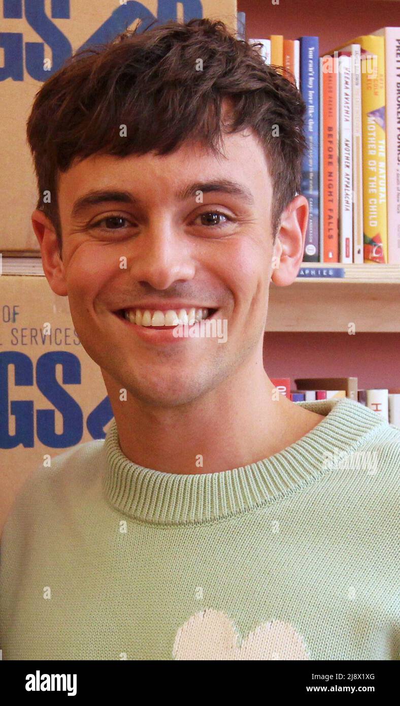 New York, USA. 18th May, 2022. Tom Daley signing copies of his book ...
