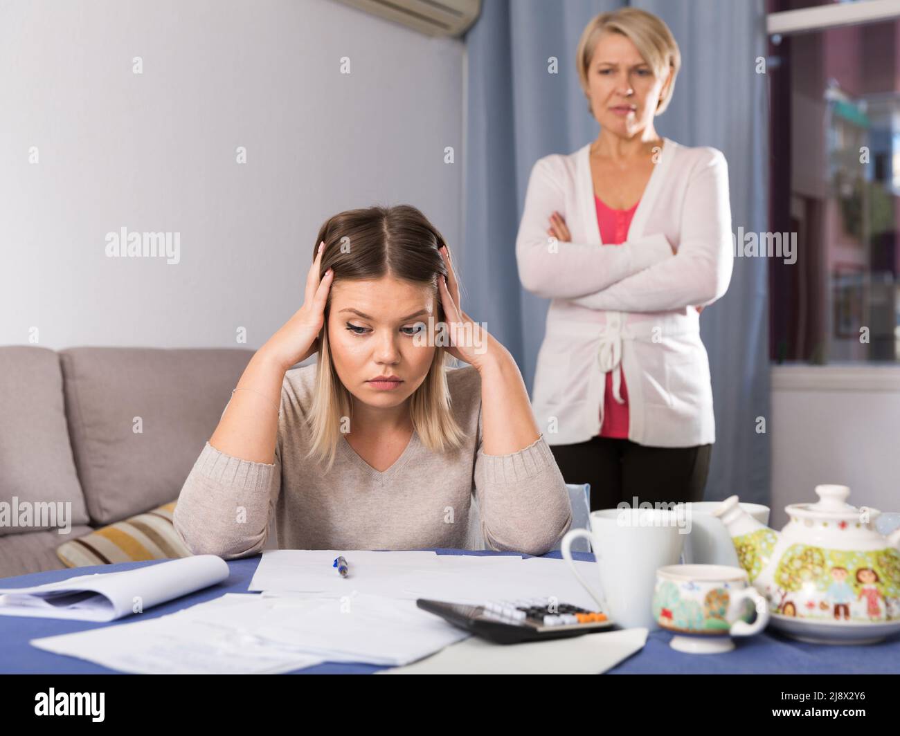 Mother scolds her adult daughter Stock Photo - Alamy