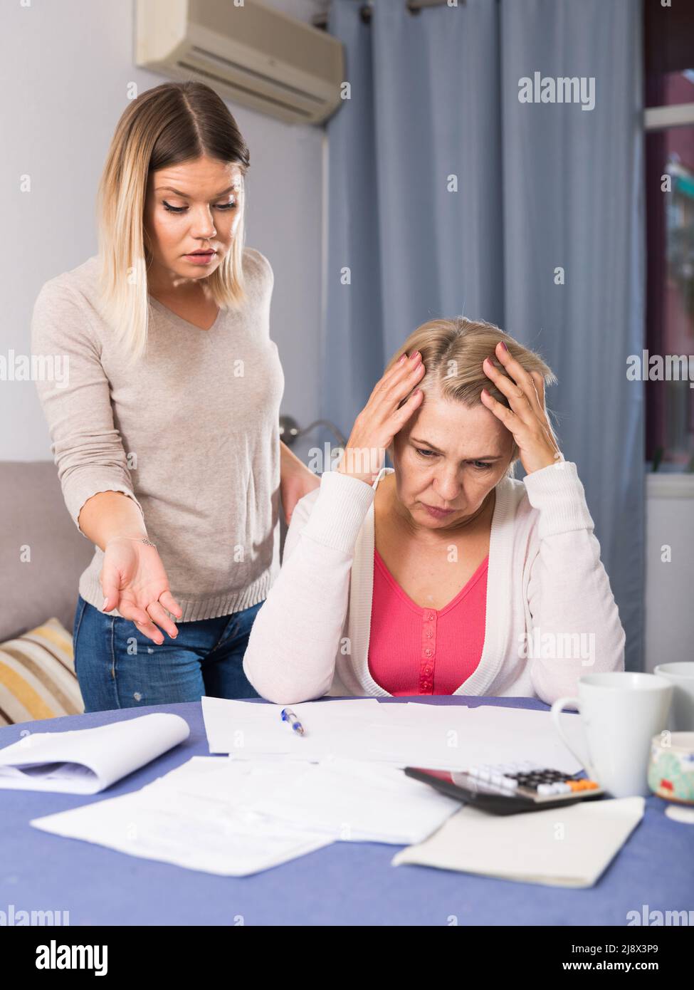 mother and her adult daughter with financial problems Stock Photo - Alamy