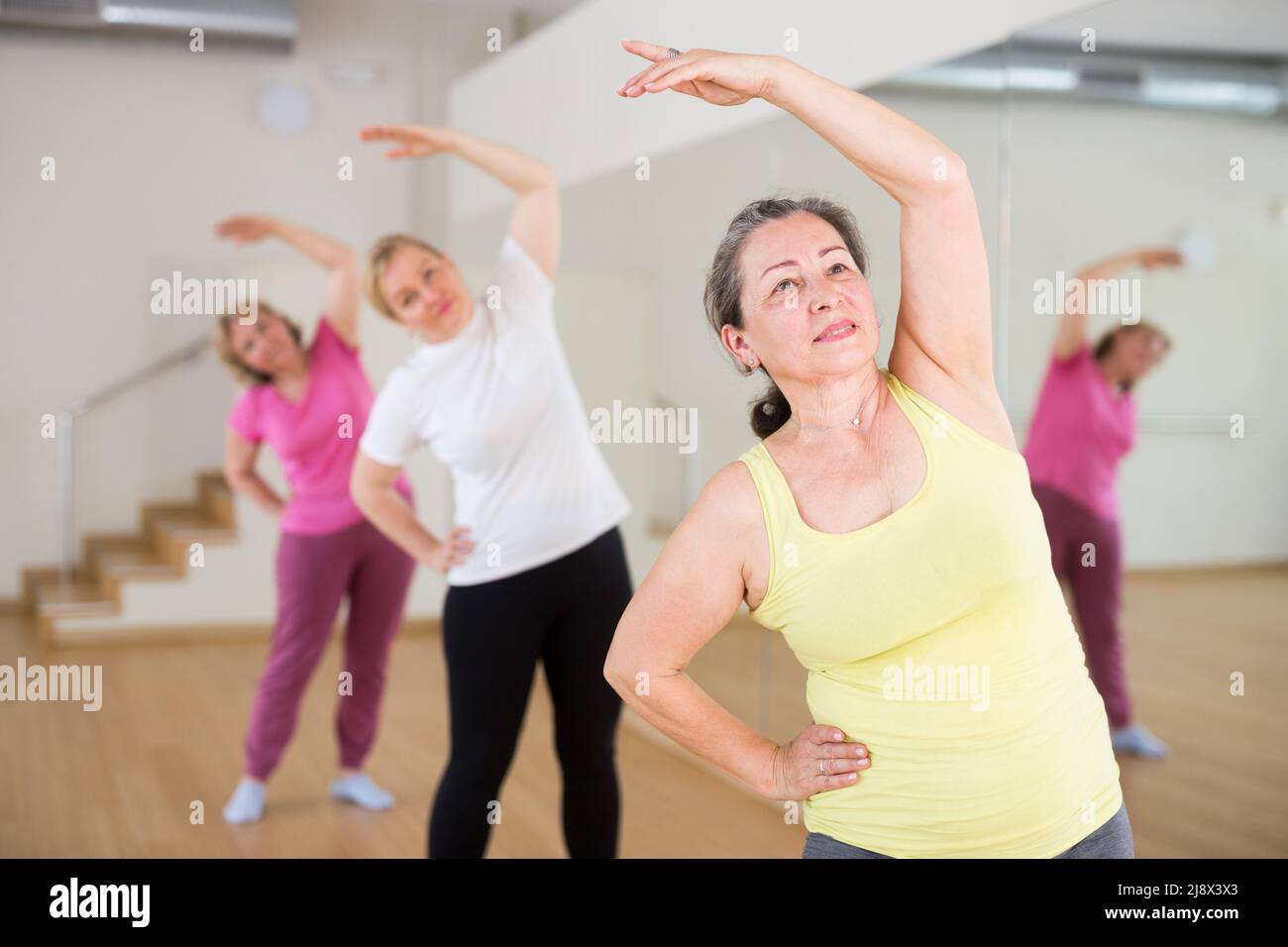 Three women are dancing Stock Photo - Alamy