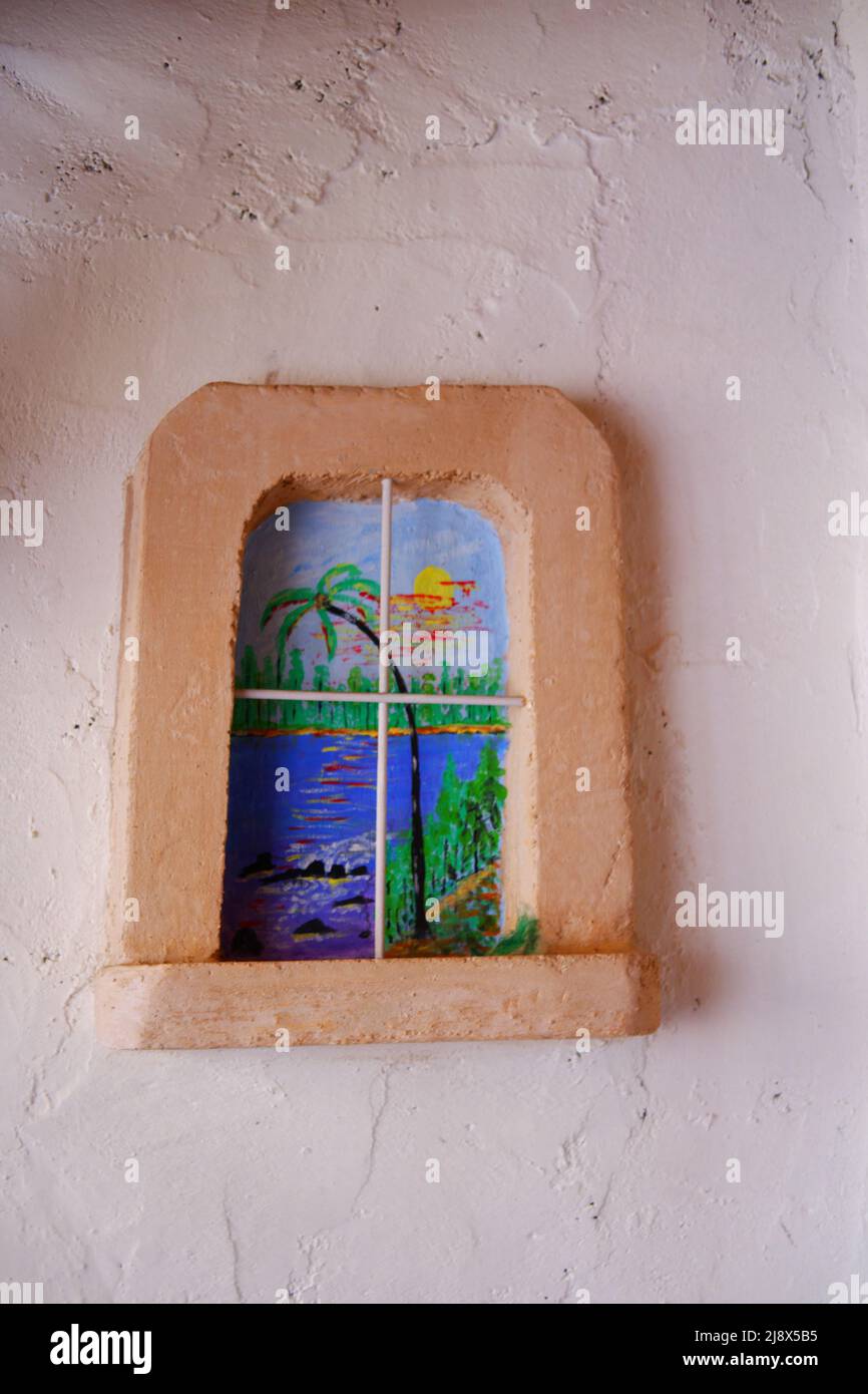 Painted window on mudwall of an old historic house Stock Photo - Alamy