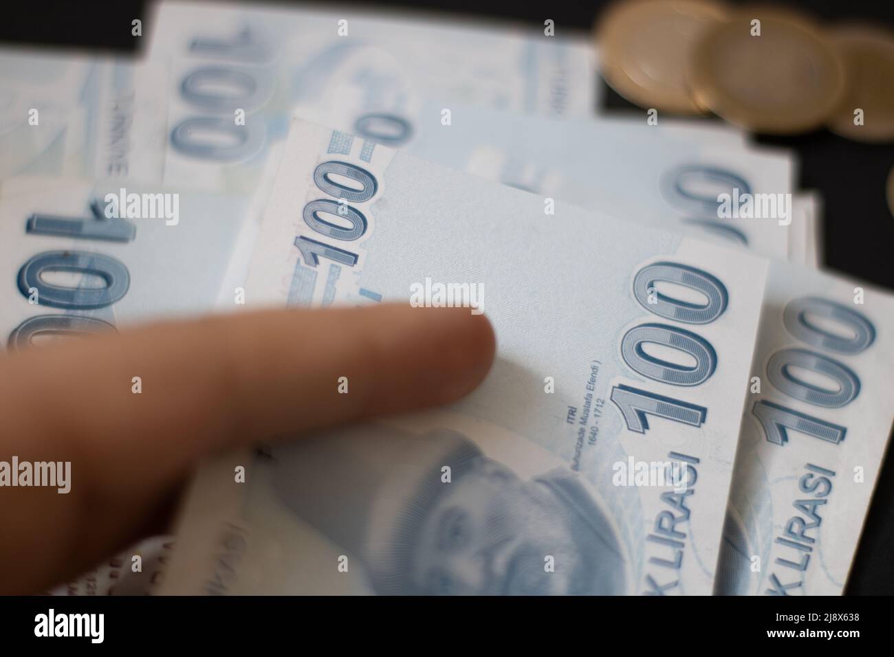 Counting money, banknotes, and coins Stock Photo - Alamy