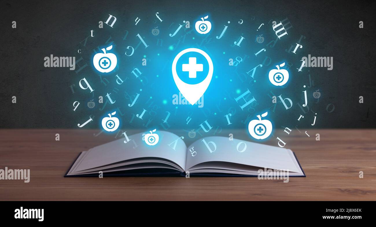 Open medical book with health icons above Stock Photo - Alamy