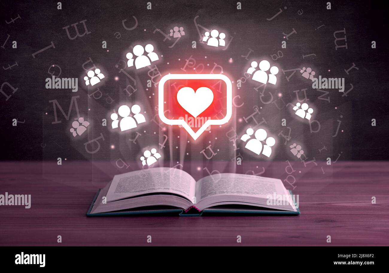 Open book with social networking icons above Stock Photo - Alamy