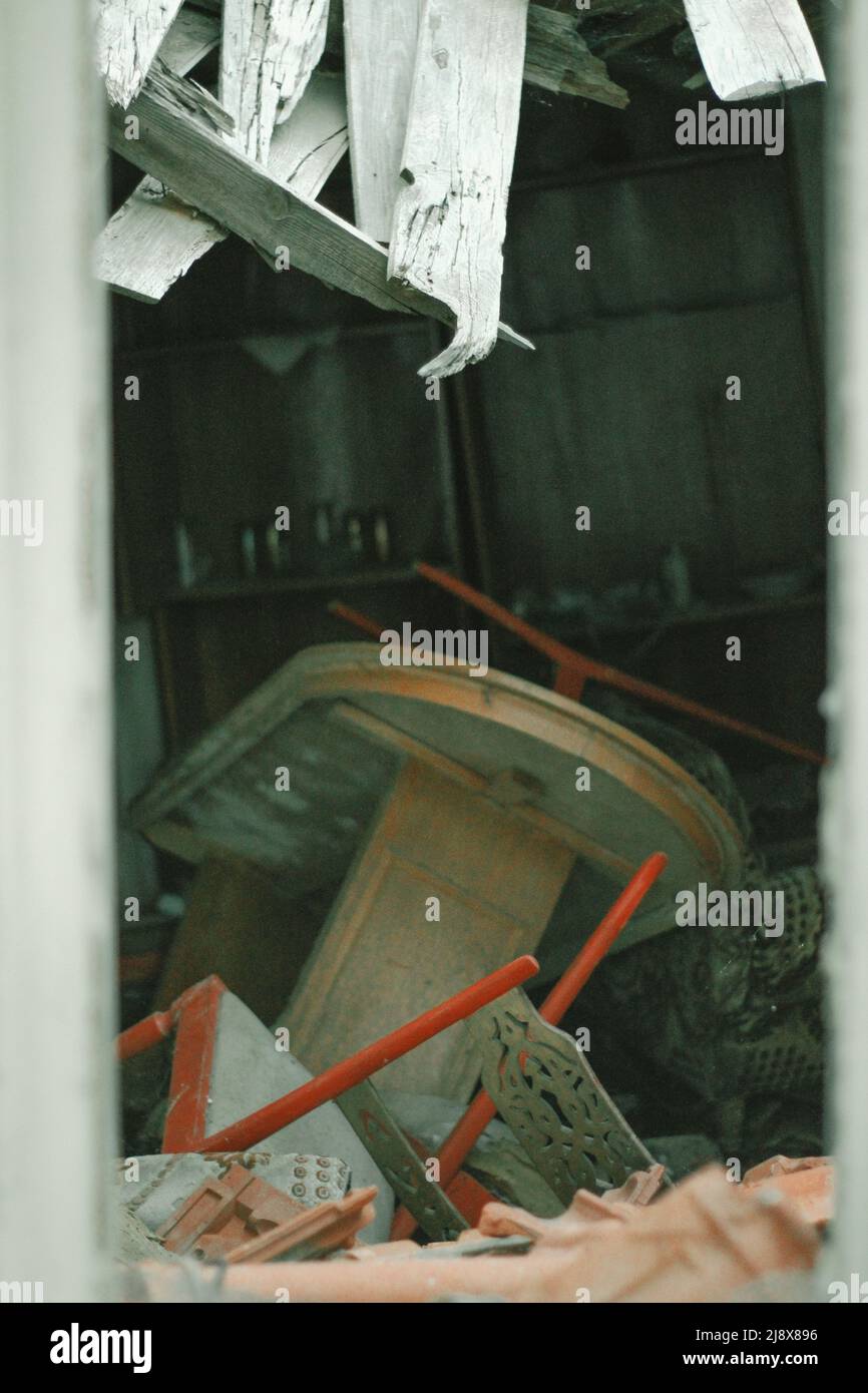 A destroyed house with broken furniture Stock Photo - Alamy