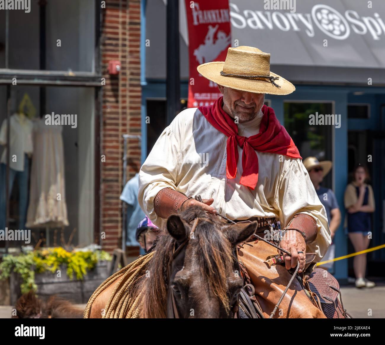 Cowboy on a horse in the Franklin Rodeo Parade Stock Photo - Alamy