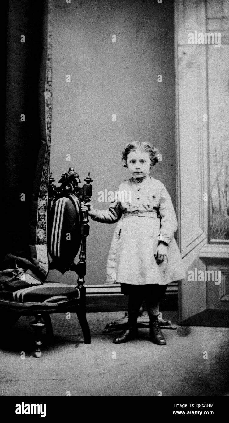 Studio portrait of a child identified on the back of the photo as Addie ...