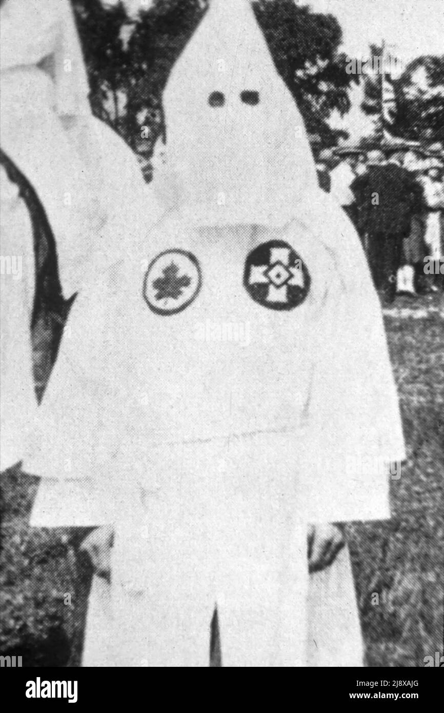 Image of a man in a hood and robe - In late 1926 Klan organizers ...