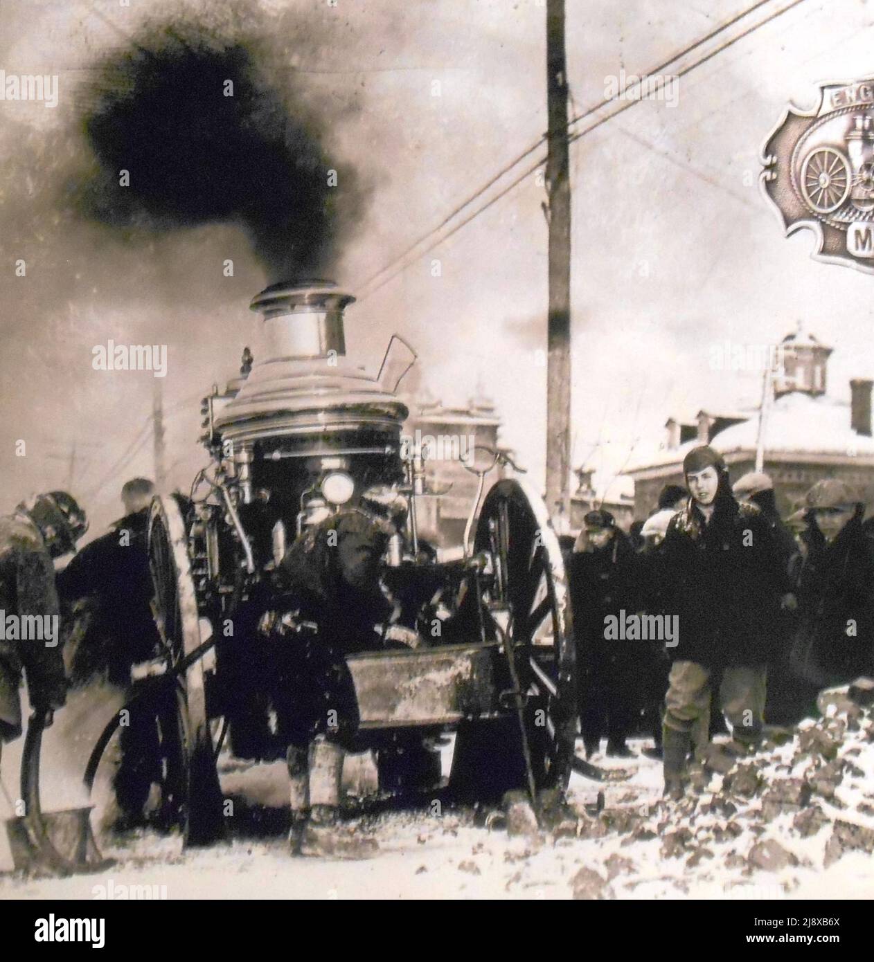 Firefighters using a steam pump fire truck, Montreal ca. 1900 Stock ...