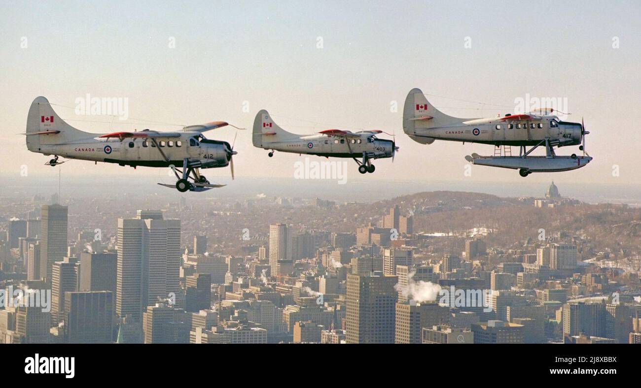 3 x 438 SQN RCAF DHC Otters (airplanes) over Montreal Quebec ca ...