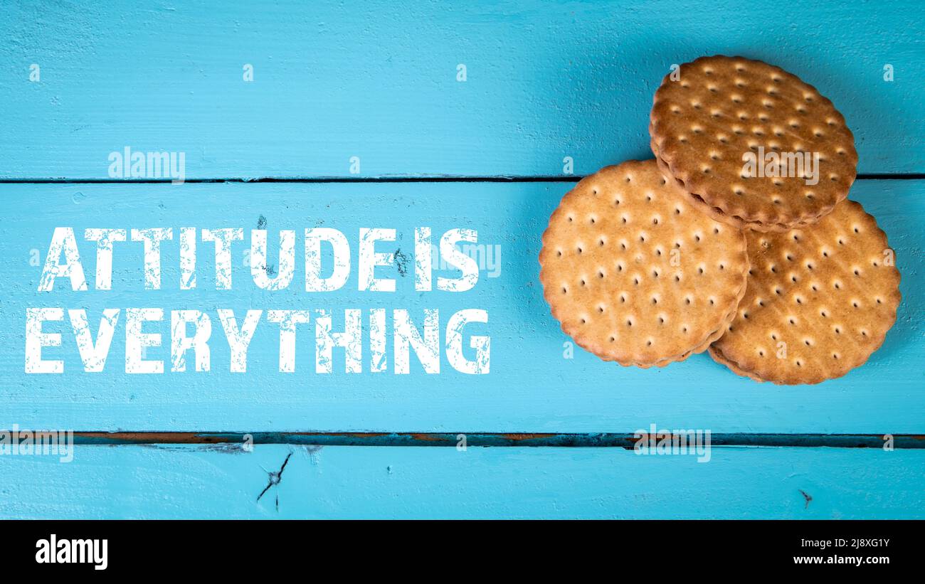 Attitude Is Everything. Stack of cookies on a blue wooden background ...