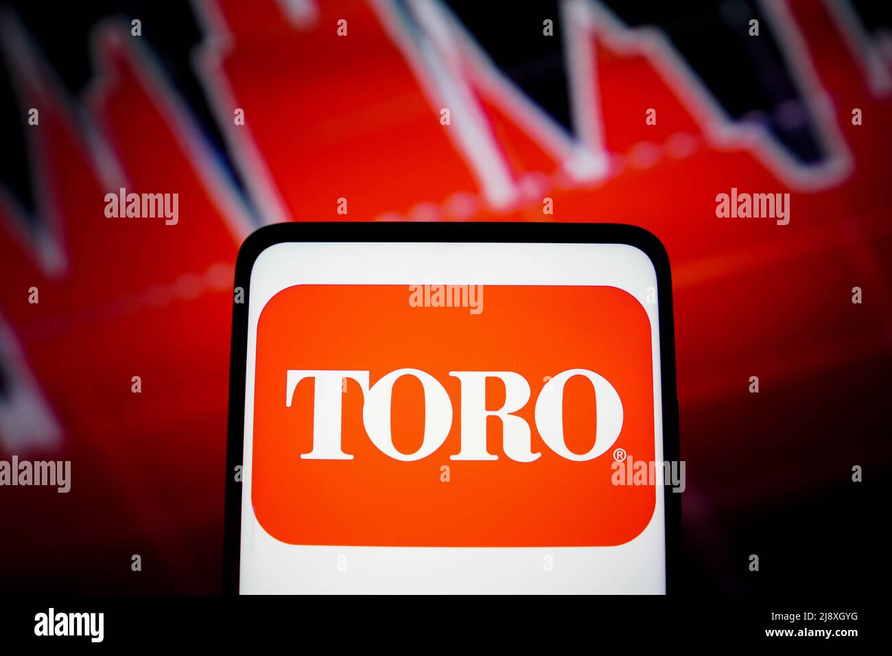 In this photo illustration, the Toro Company logo seen displayed on a ...