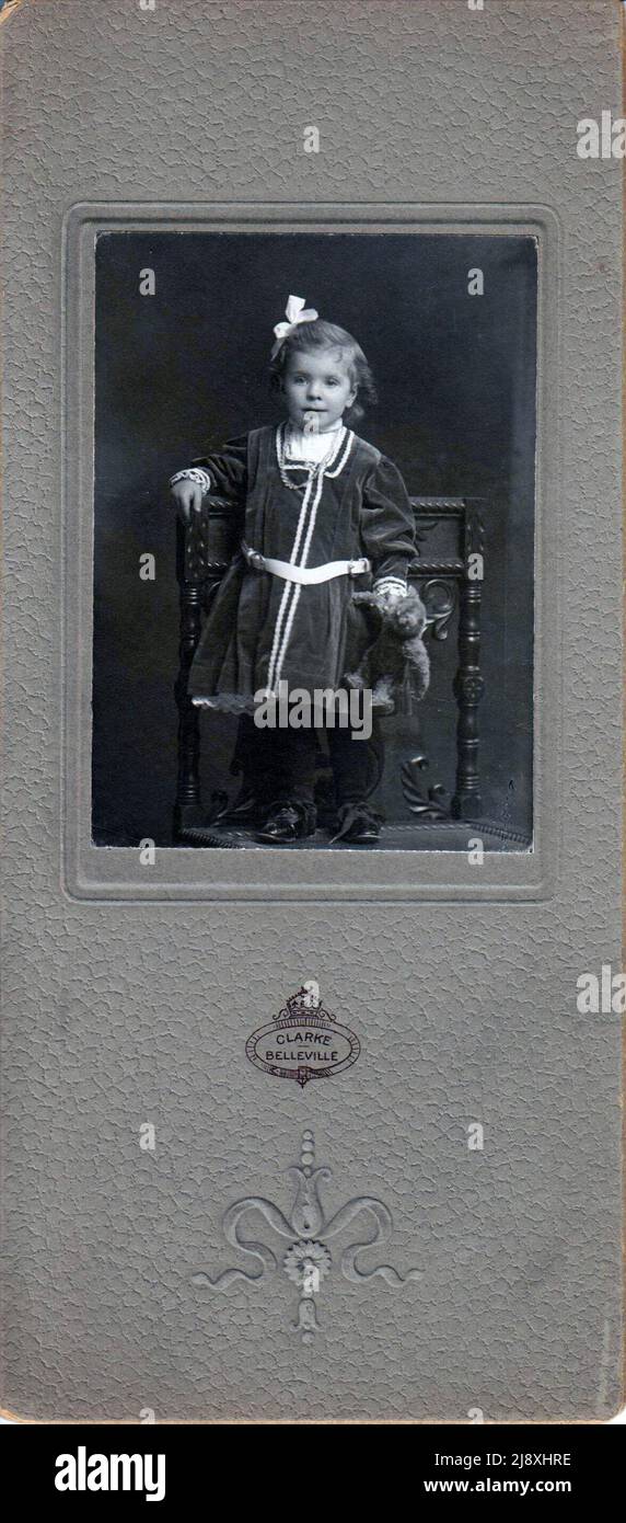 Early 1900s photo of Hazel Hawley as a child, standing on a chair with ...