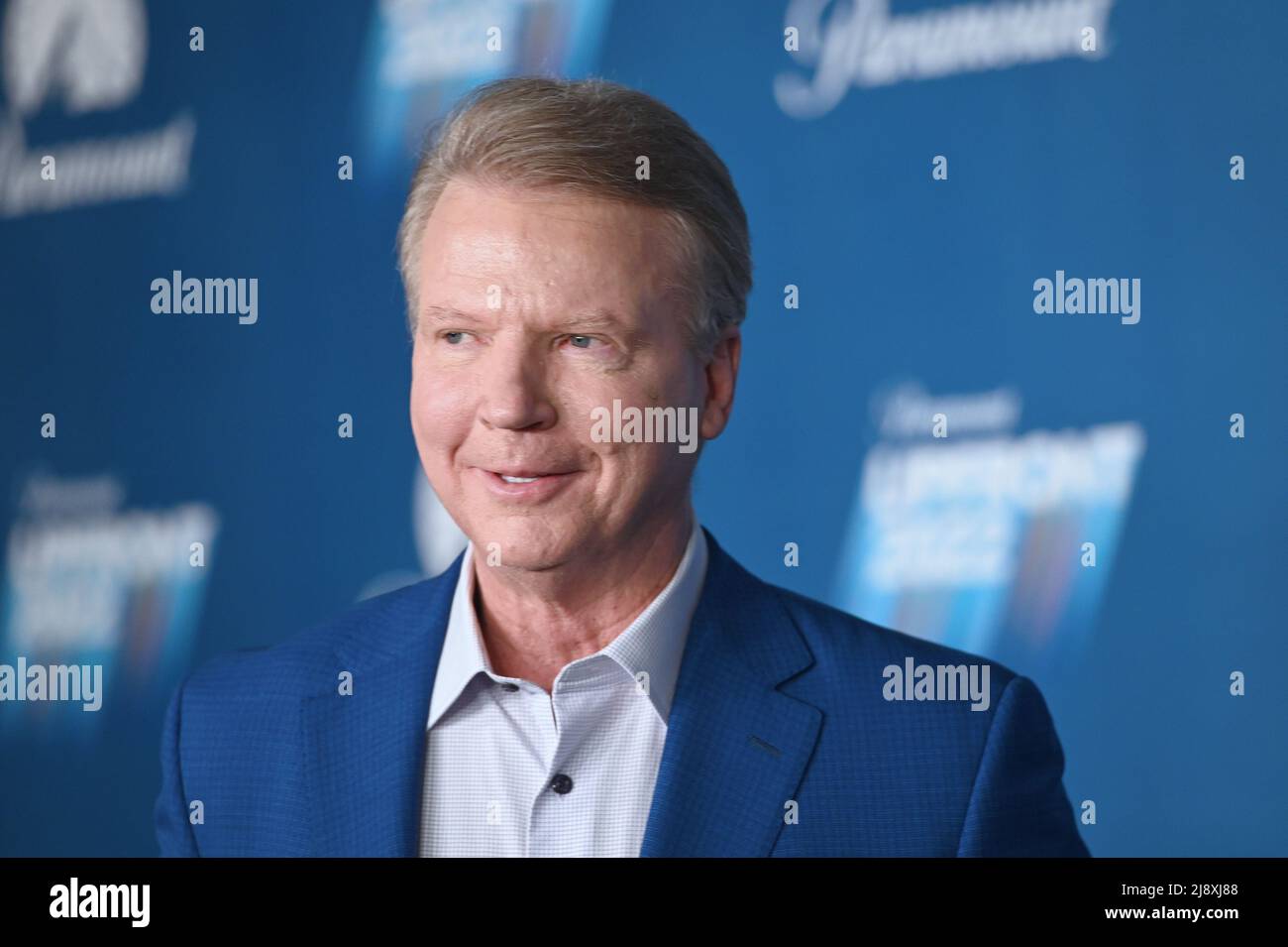 Phil Simms attends the Paramount Upfront 2002 Post Party blue carpet in ...