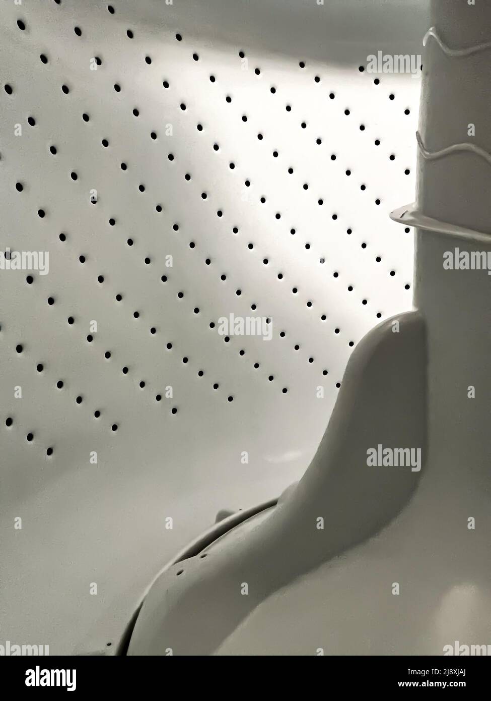 Inside view of a top loading laundry washing machine Stock Photo - Alamy