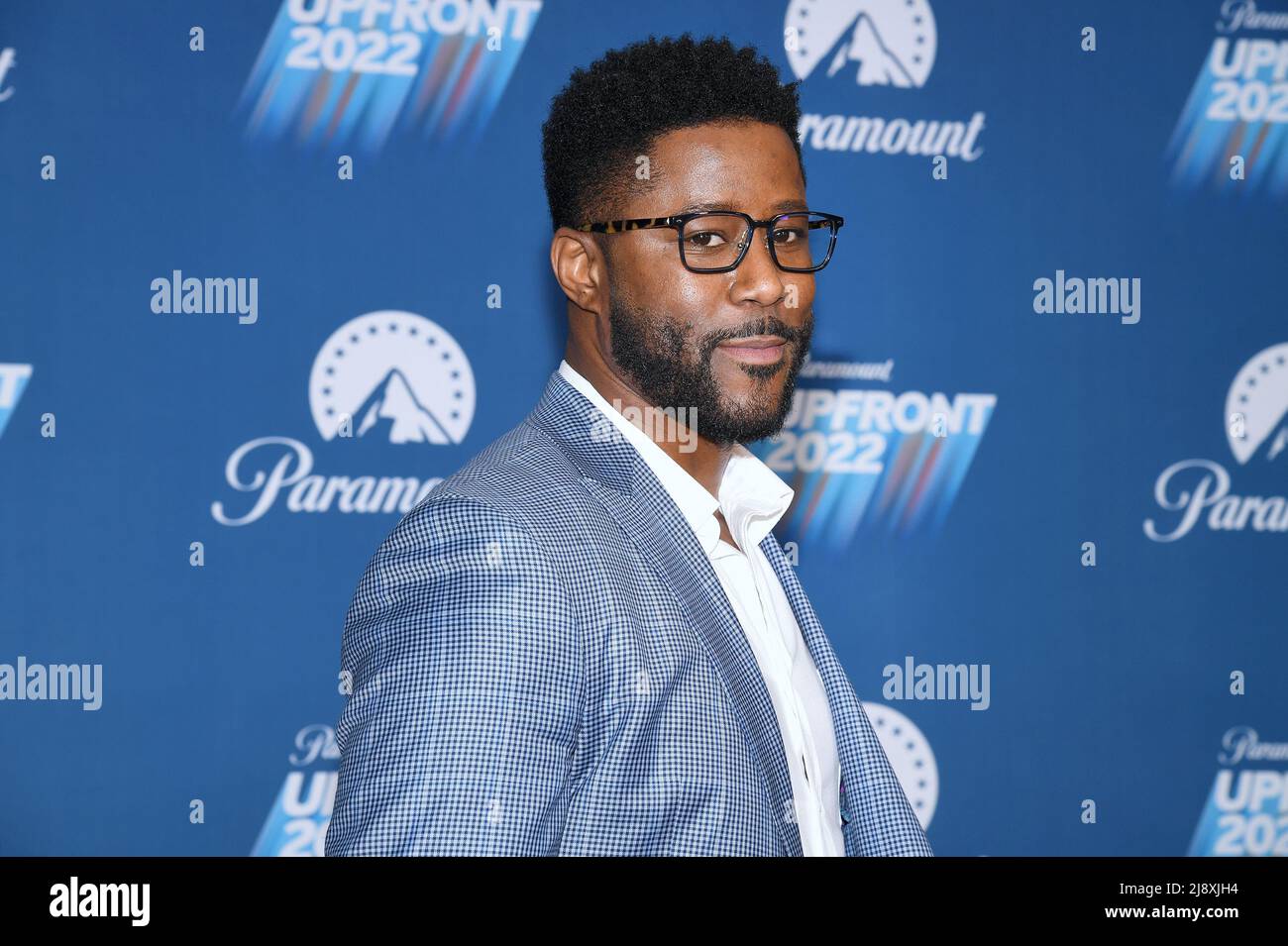 Nate Burleson attends the Paramount Upfront 2002 Post Party blue carpet ...
