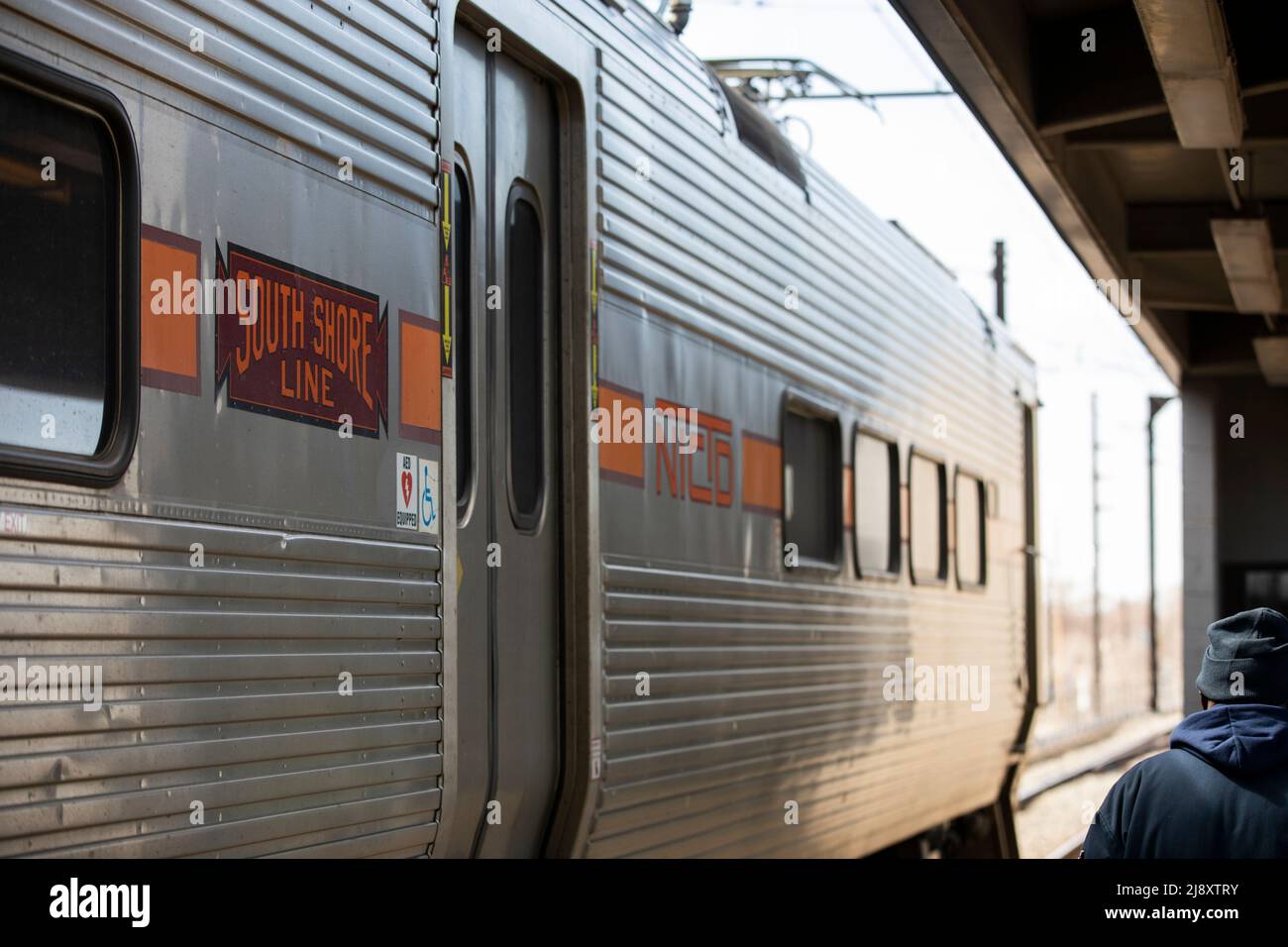 Gary, Indiana, USA - March 28, 2022: Train cars of the South Shore Line stop in Downtown Gary ...