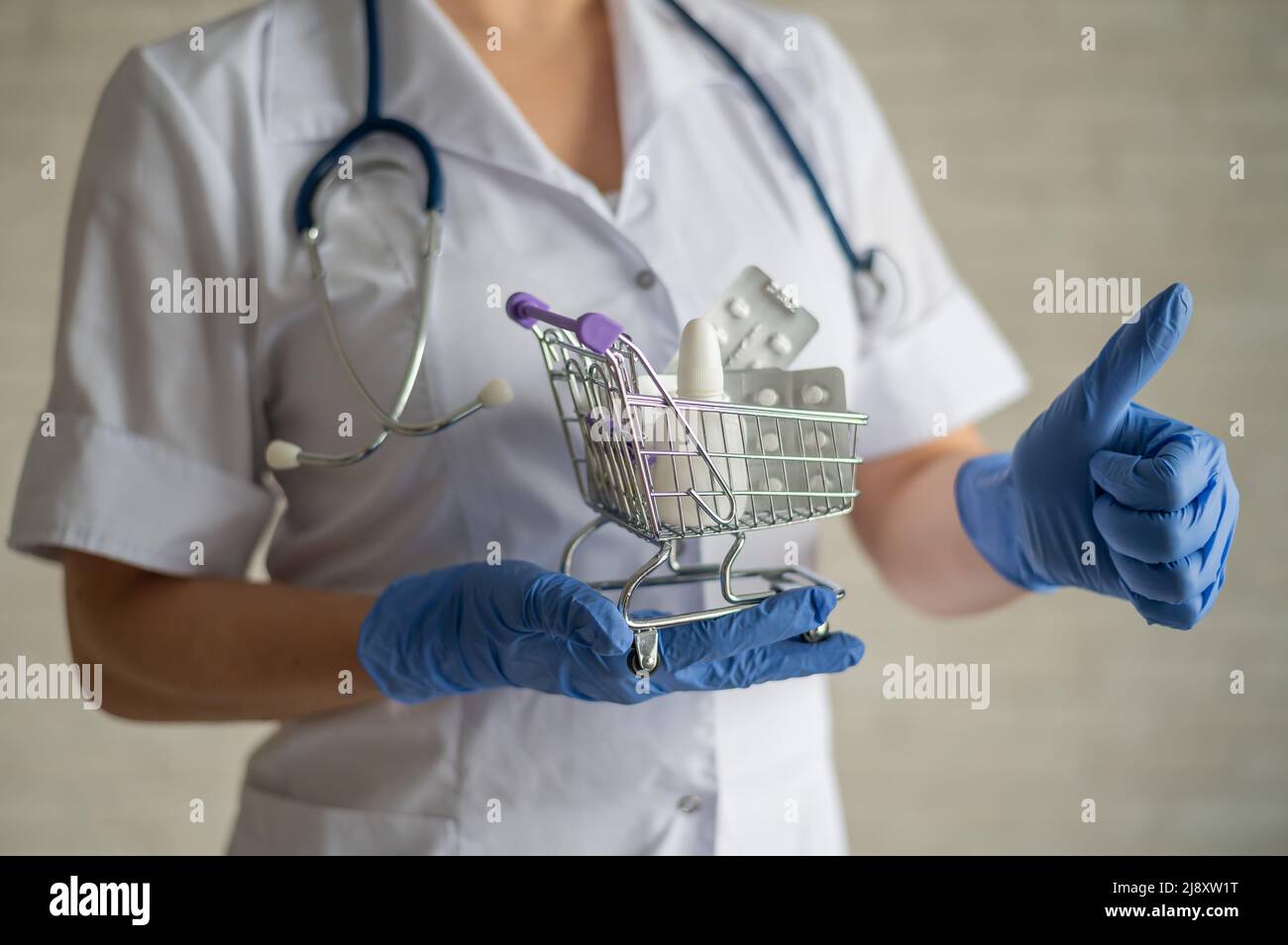 Woman shows pill hi-res stock photography and images - Alamy