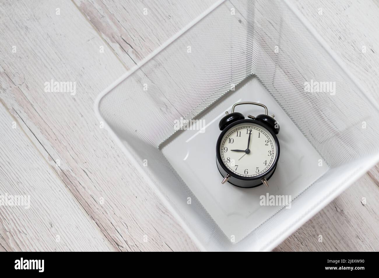 Alarm clock in bin hi-res stock photography and images - Alamy