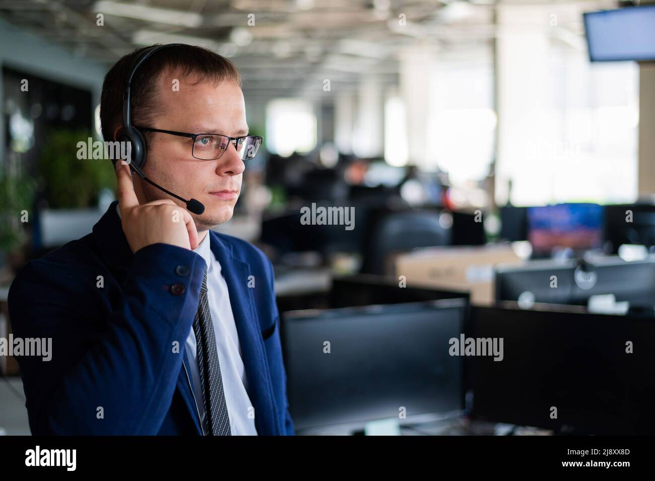 Call center man microphone earphones hi-res stock photography and images - Alamy