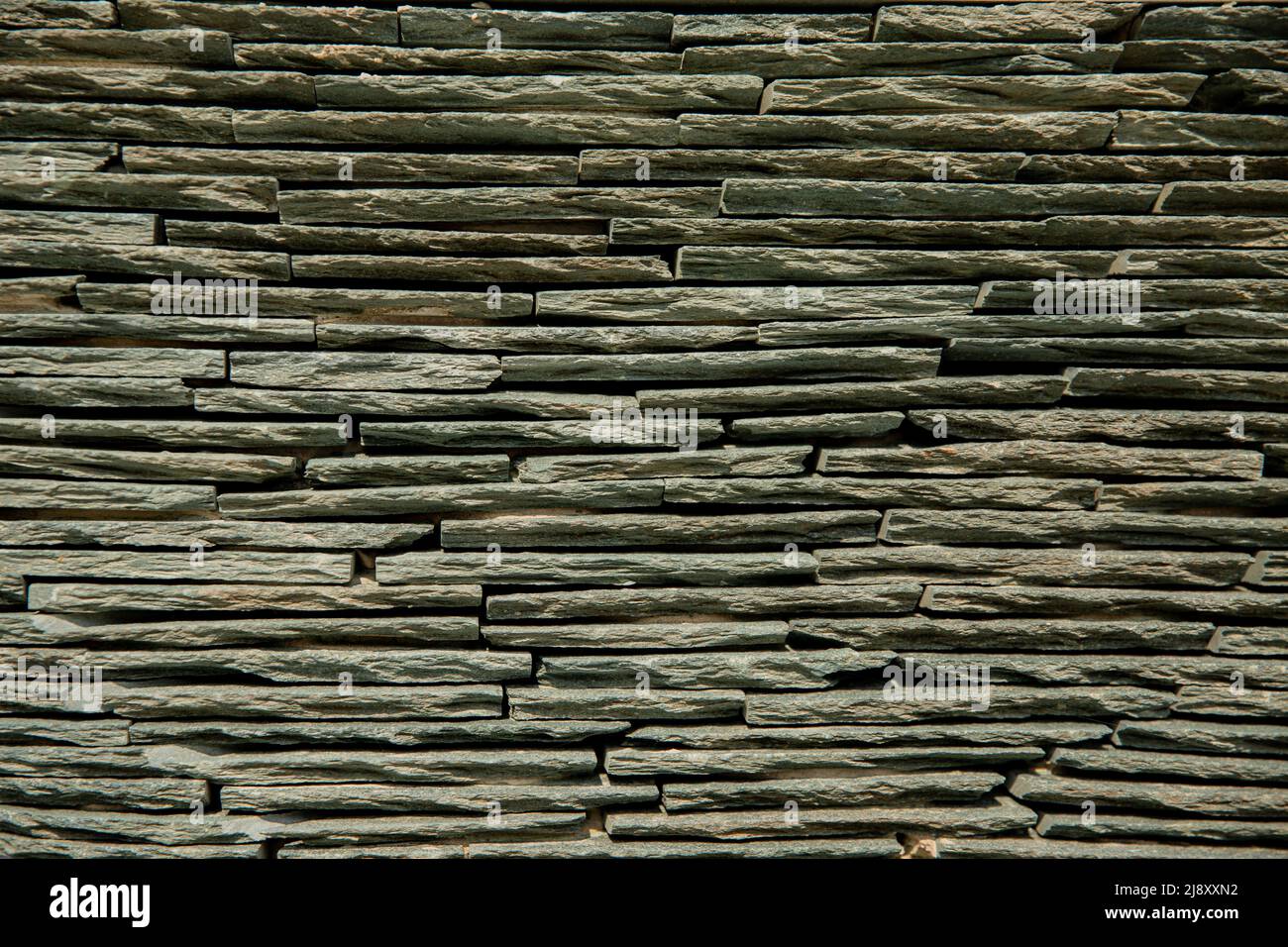 A full frame background of layers of slate from Honister Slate Mine in ...