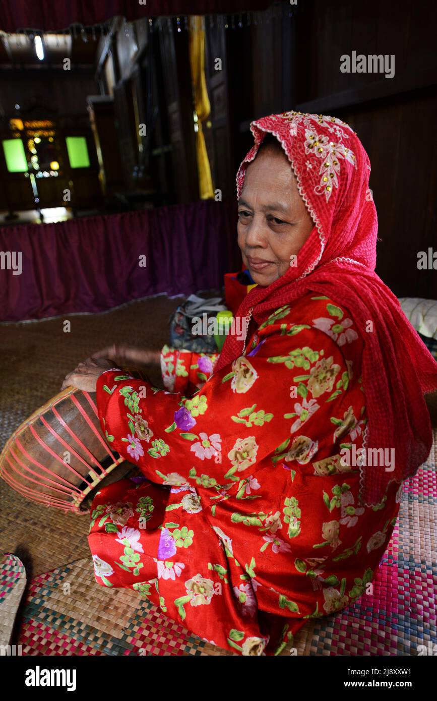 Malay (Melayu) woman playing drum, Sarawak Cultural Village, Kuching ...