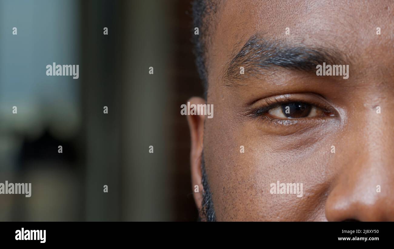 Close up blinking african male hi-res stock photography and images - Alamy
