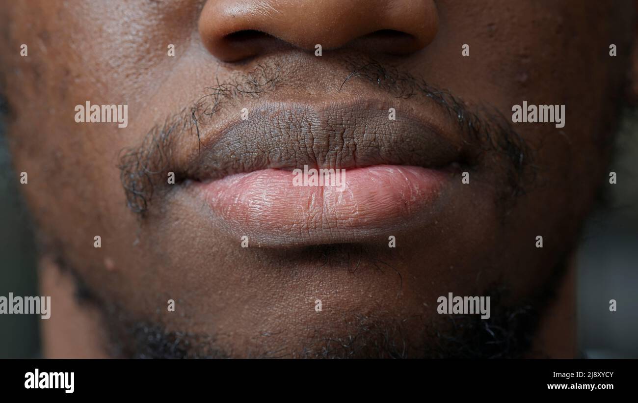 Macro shot of young man smiling in front of camera, having short haired ...