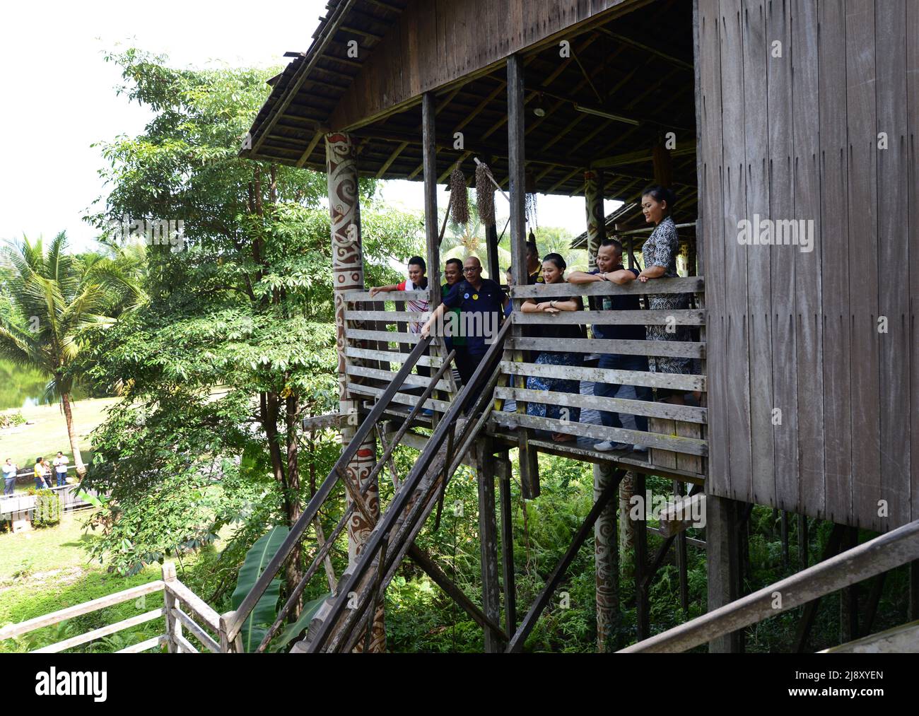 Traditional village house in t he cultural village near Kuching ...