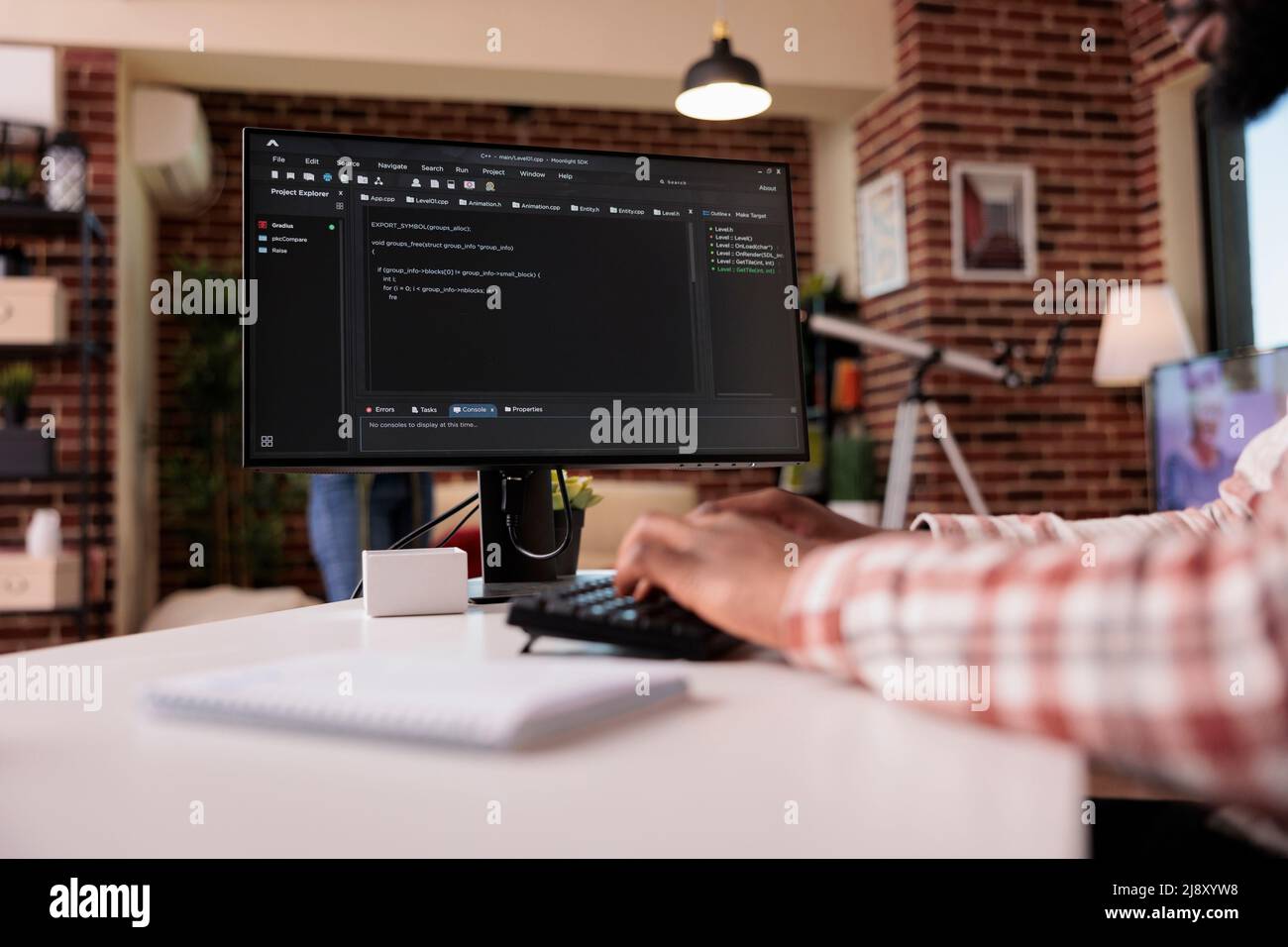 Closeup Of System Developer Writing Code On Personal Computer Typing