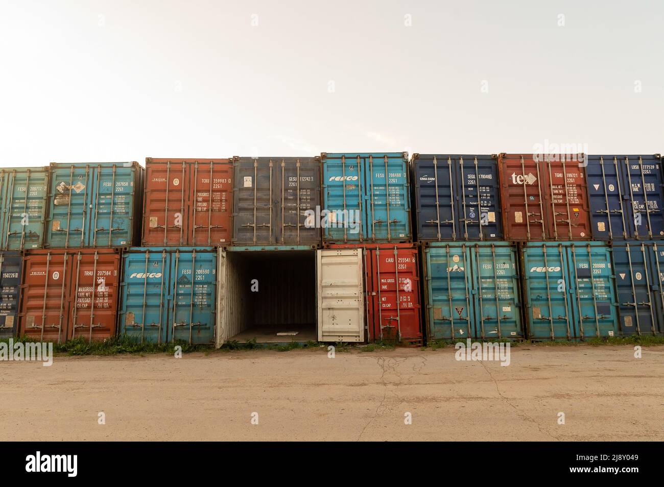 Warehouse of freight containers. Metal boxes loaded with each other in ...