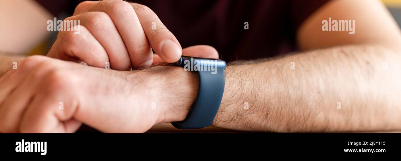 02.23.2022 Moscow. male hand with wrist smart apple watch. young man ...