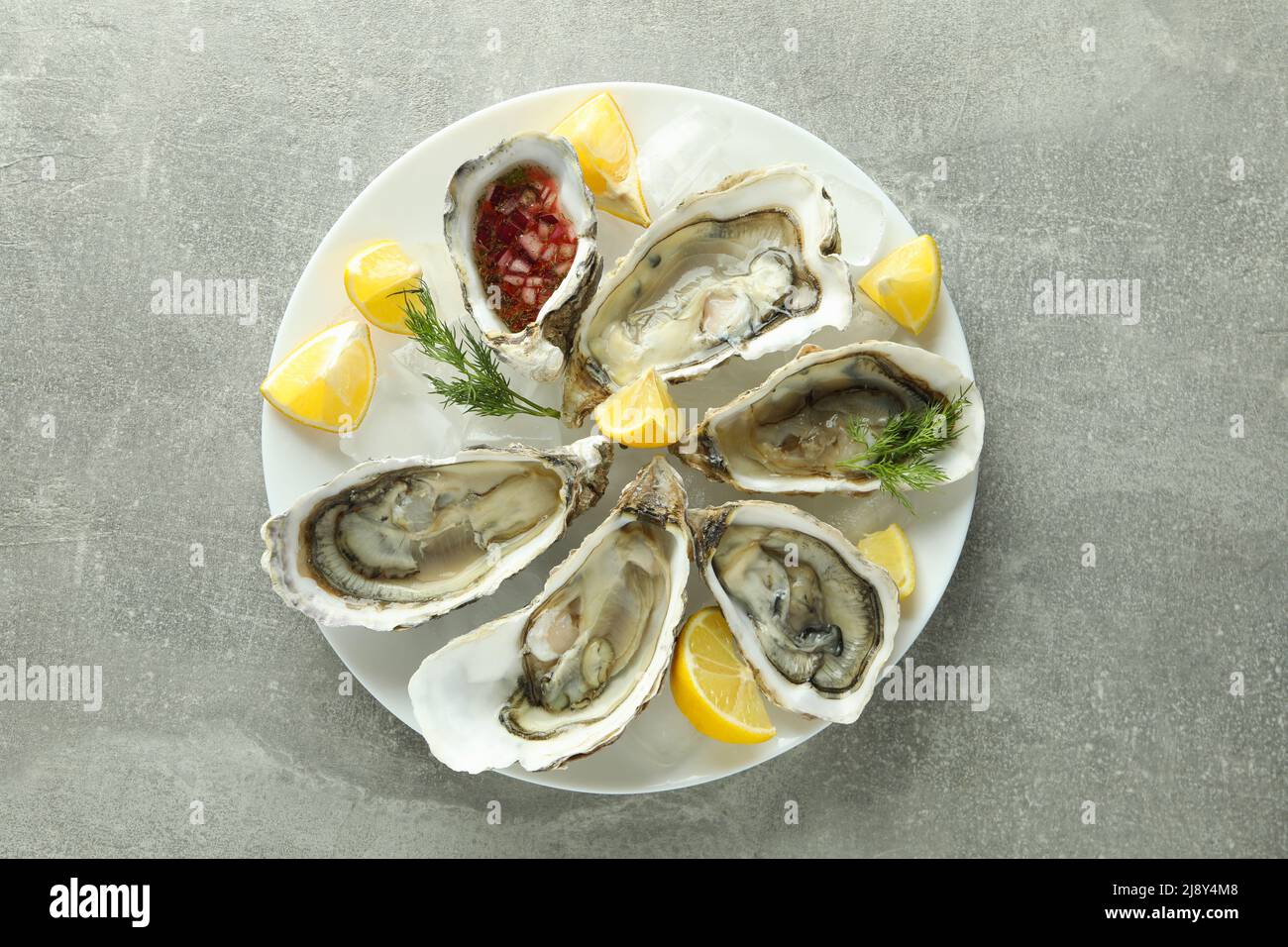 Concept of delicious seafood, oysters, top view Stock Photo - Alamy