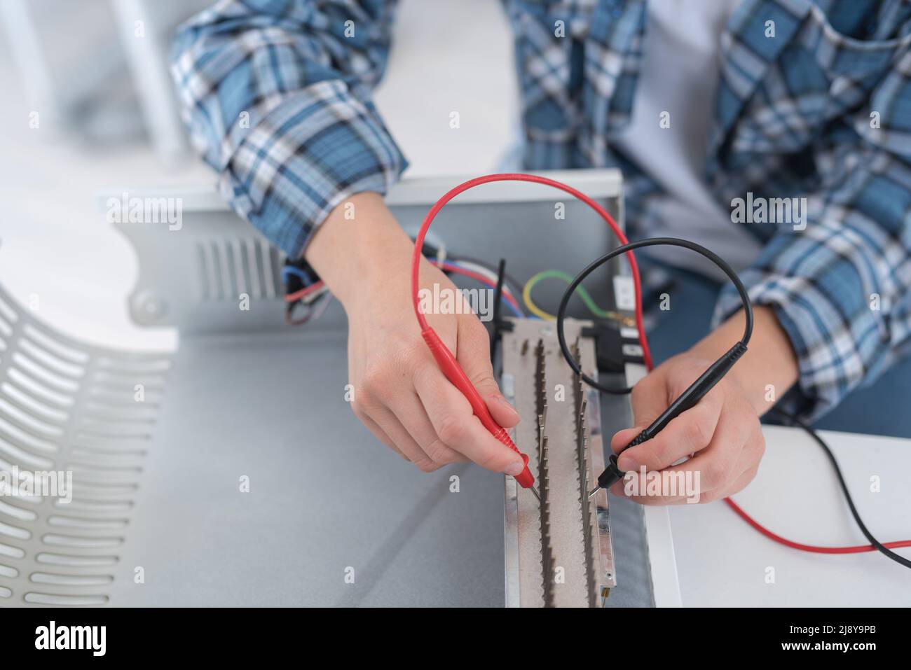 technician diagnose broken heating system Stock Photo - Alamy
