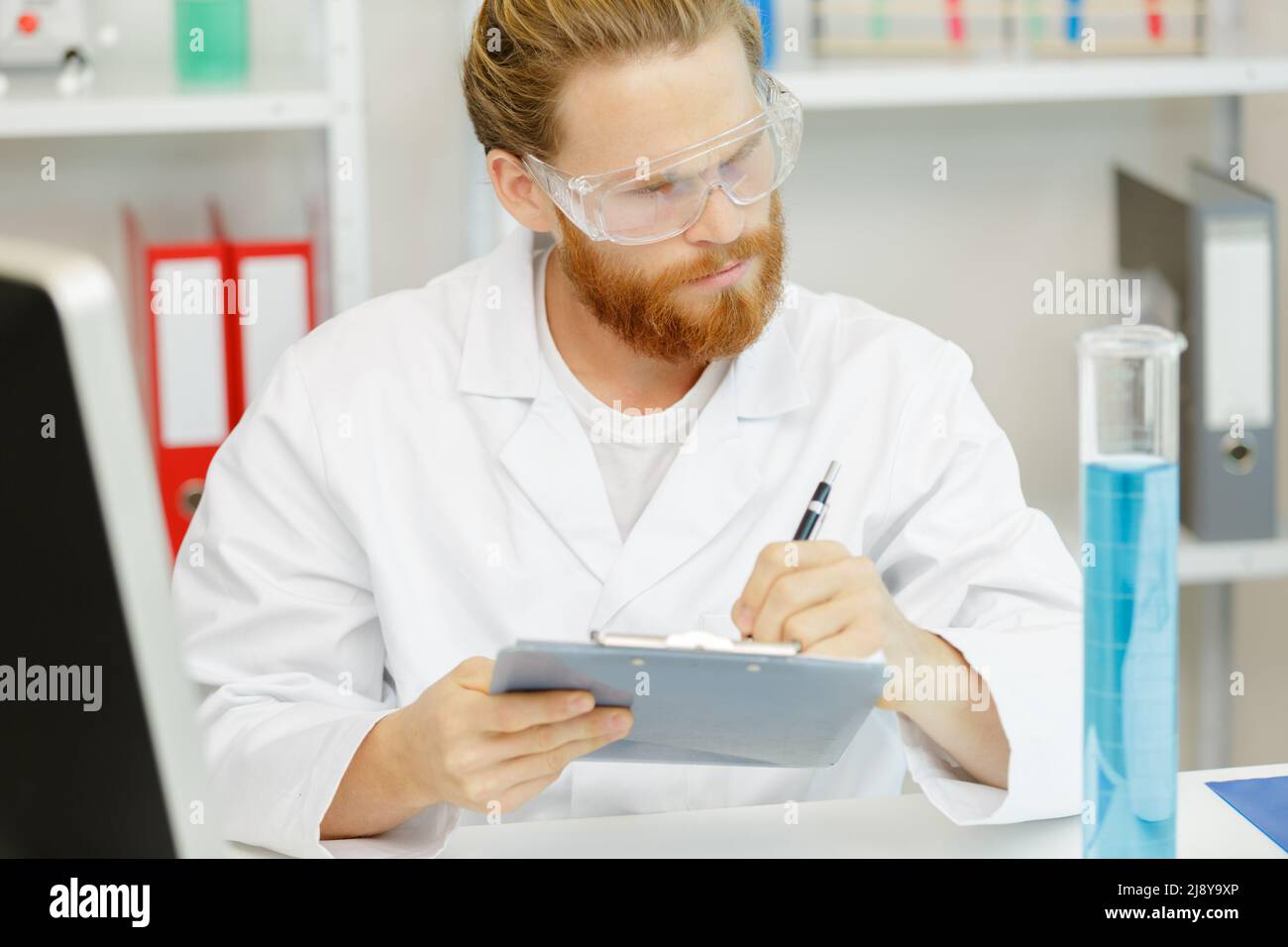 Biology student making notes hi-res stock photography and images - Alamy