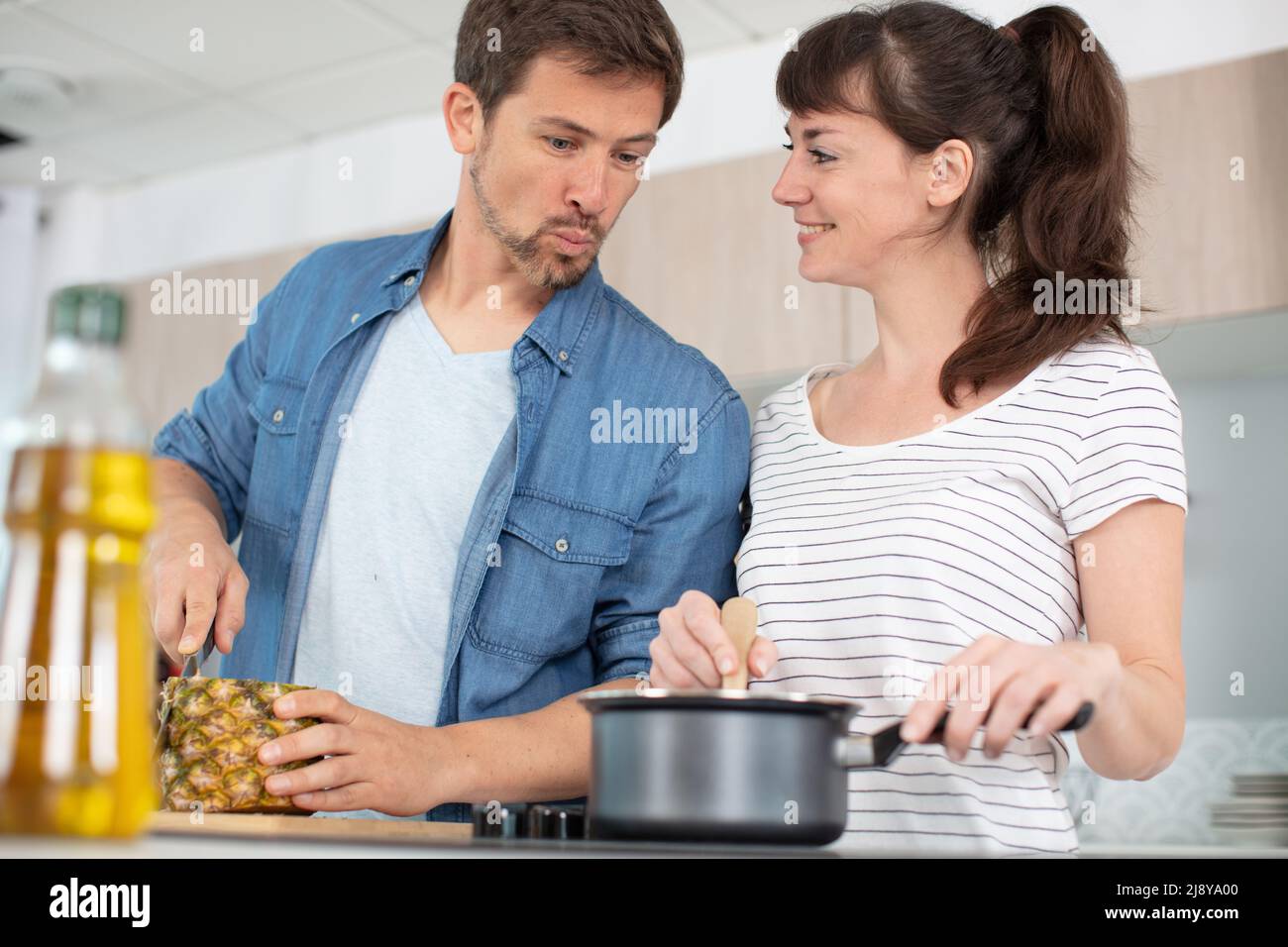 Middle aged couple cutting hi-res stock photography and images - Alamy