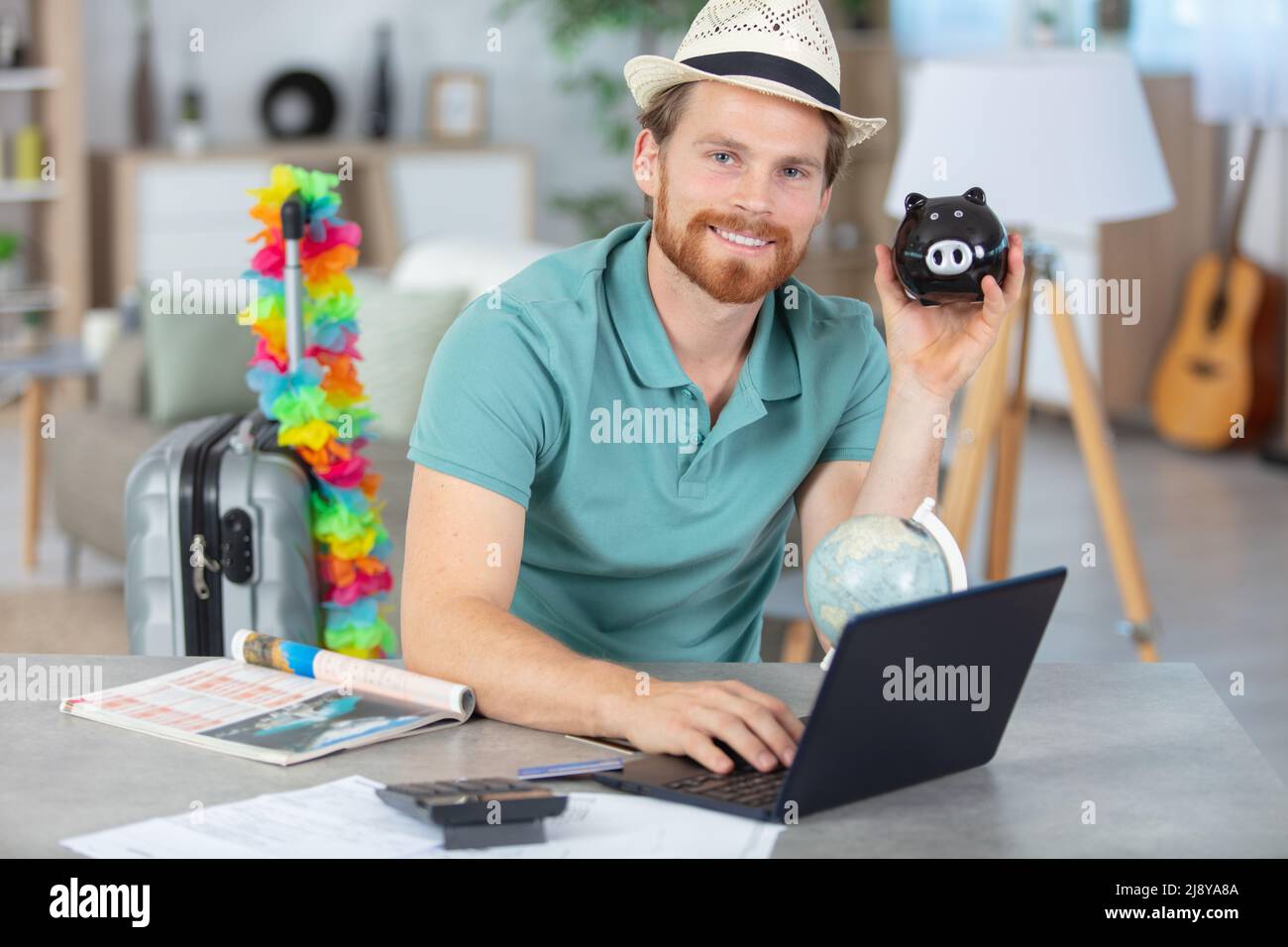 Young man planning his next journey hi-res stock photography and images ...