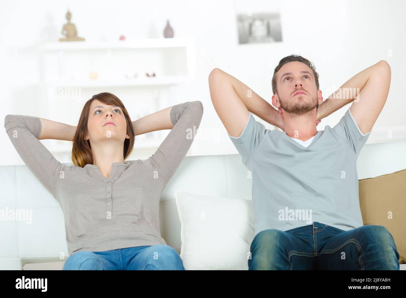 Couple looking at the ceiling Stock Photo - Alamy