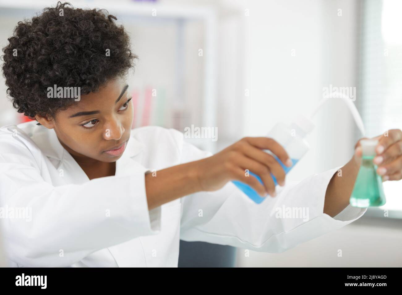 Conducting experiments hi-res stock photography and images - Alamy