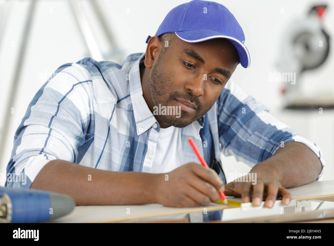 Professional carpenter making mark hi-res stock photography and images ...