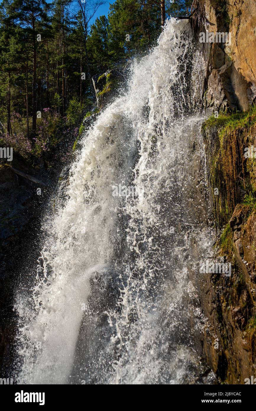 Kamysh waterfall at sunset light, spring time in the Altai Republic ...