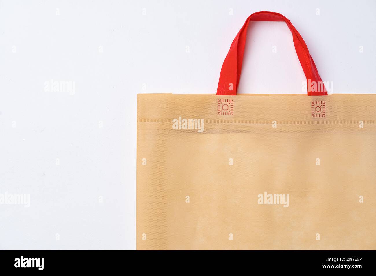 Empty fabric shopping bag on white background Stock Photo - Alamy