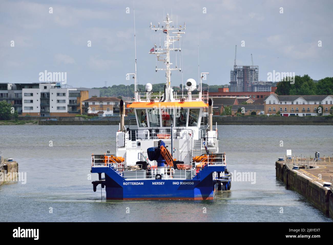 Hybrid powered water-injection dredger Mersey working the KGV Lock in ...