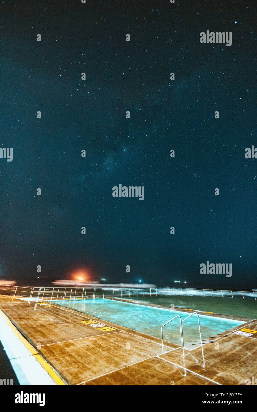Towradgi Beach ocean pool at night Stock Photo - Alamy