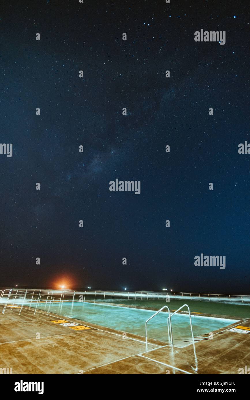 Towradgi Beach ocean pool at night Stock Photo - Alamy