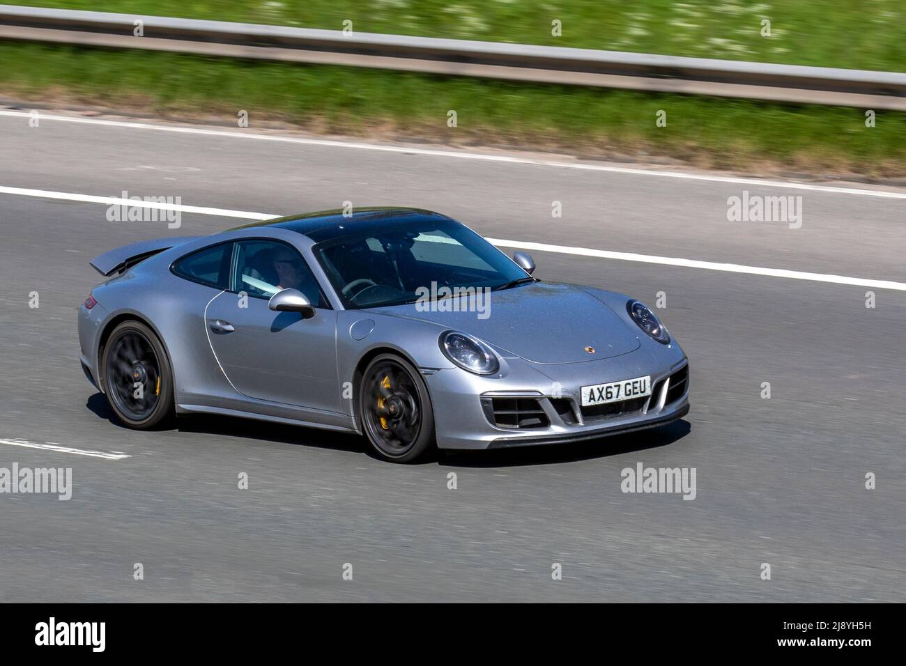 2017 silver Porsche 911 Carrera GTS PDK 2981cc petrol roadster; driving ...