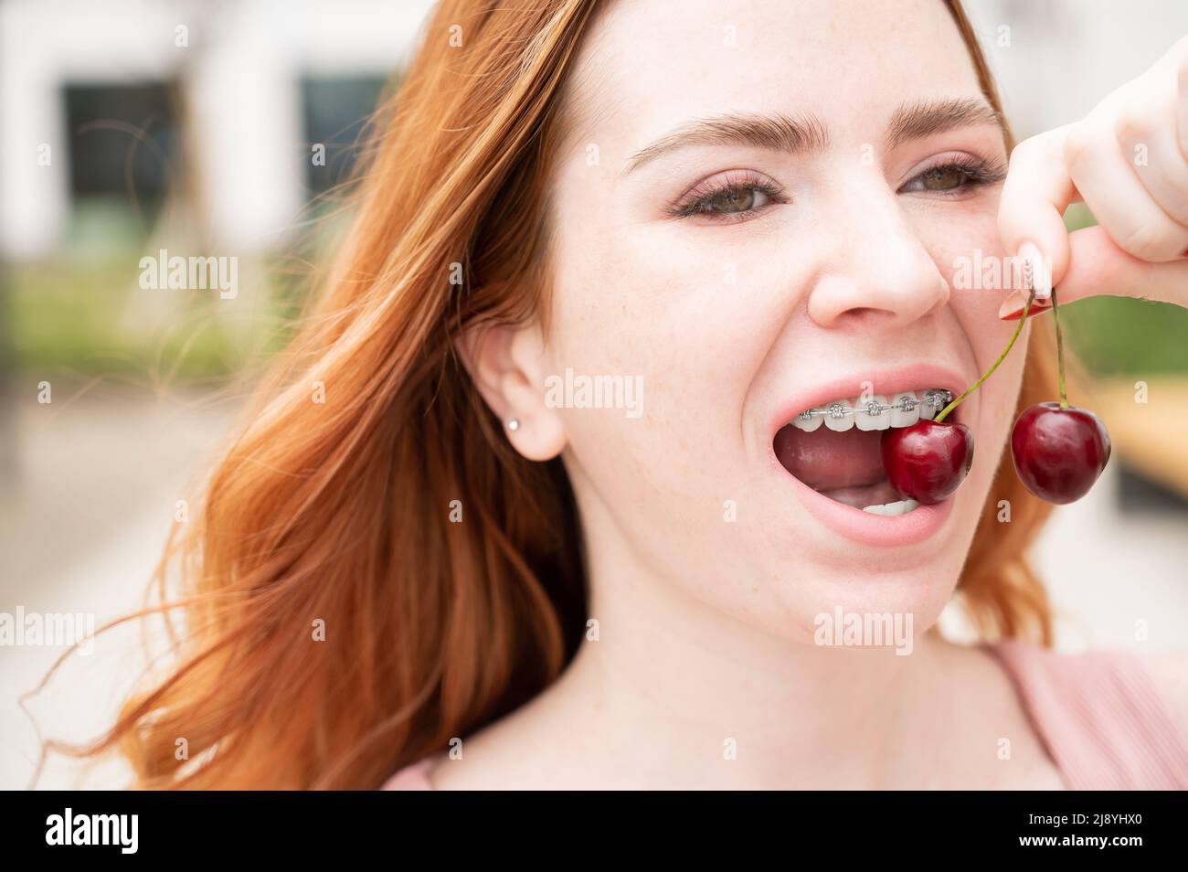 Pretty girl with braces and freckles hi-res stock photography and ...