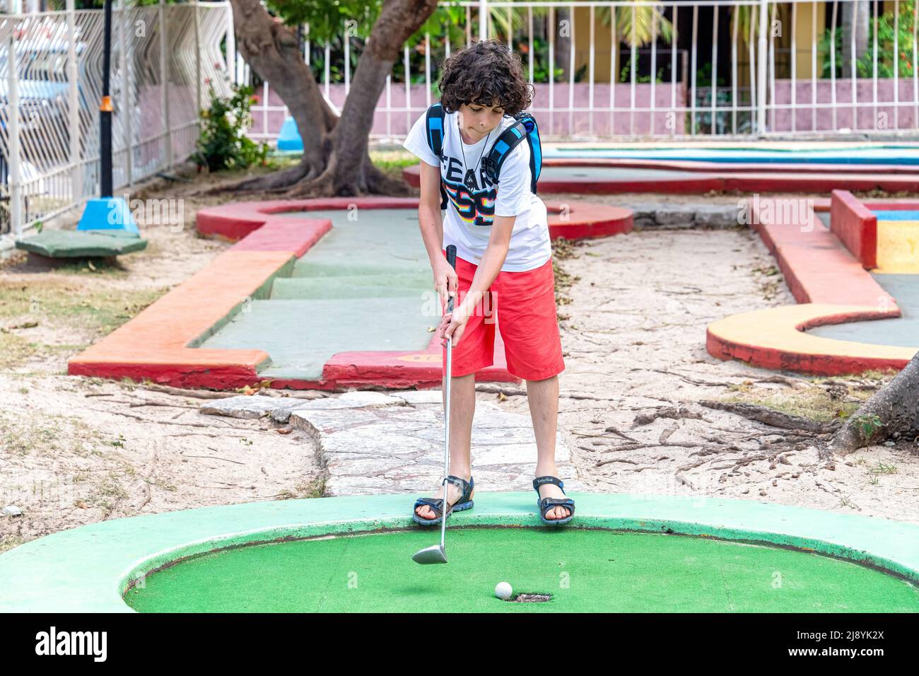 A Cuban-Canadian child playing in the El Golfito (mini-golf and snack ...